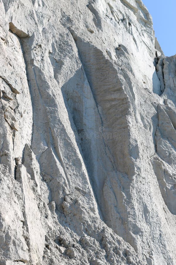 Cliff Face with Falling Rocks Stock Image - Image of wallpaper, mineral ...