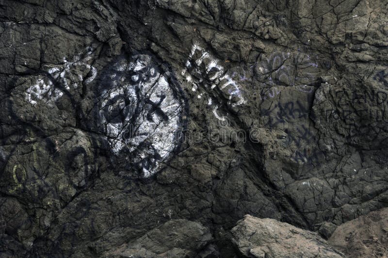 Cliff graffiti editorial photo. Image of sutra, black - 49881151