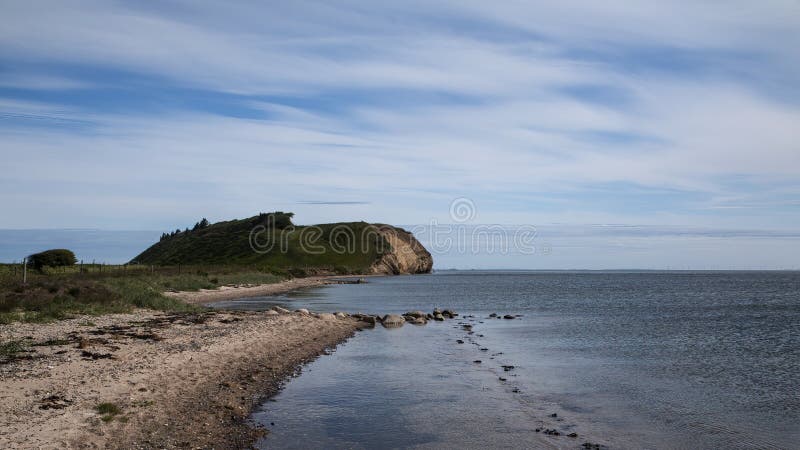 Cliff on the Island Mors stock photo. Image of beach - 250635814