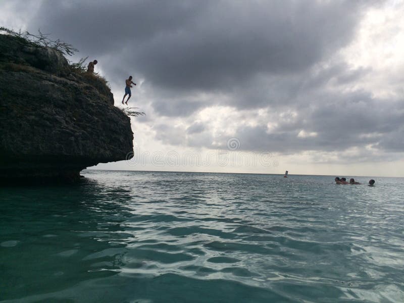 Cliff jumping stock photo. Image of horizon, inlet, loch - 43549408