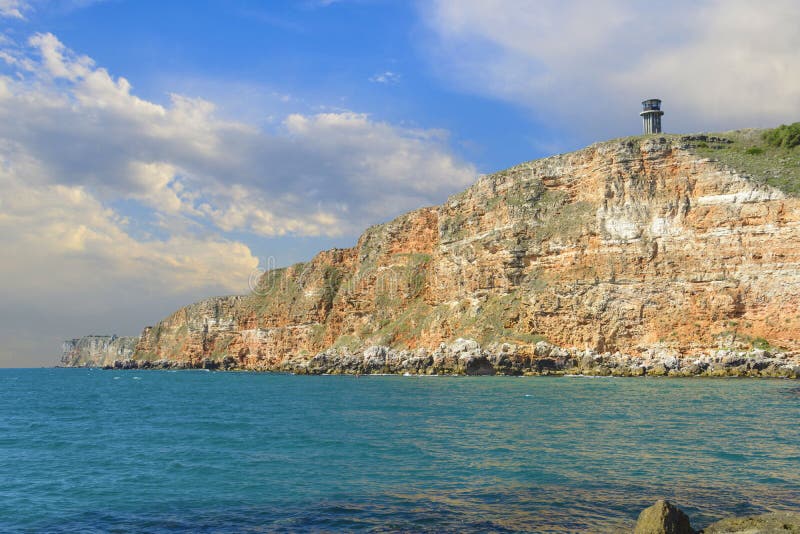 Cliff with lighthouse stock image. Image of energy, history - 107938393