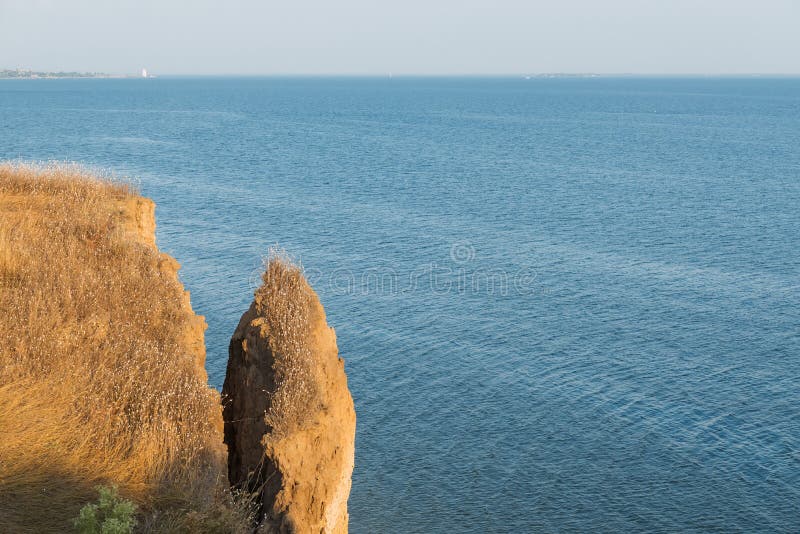 Cliff over the sea stock photo. Image of blue, clay, environment - 91732526