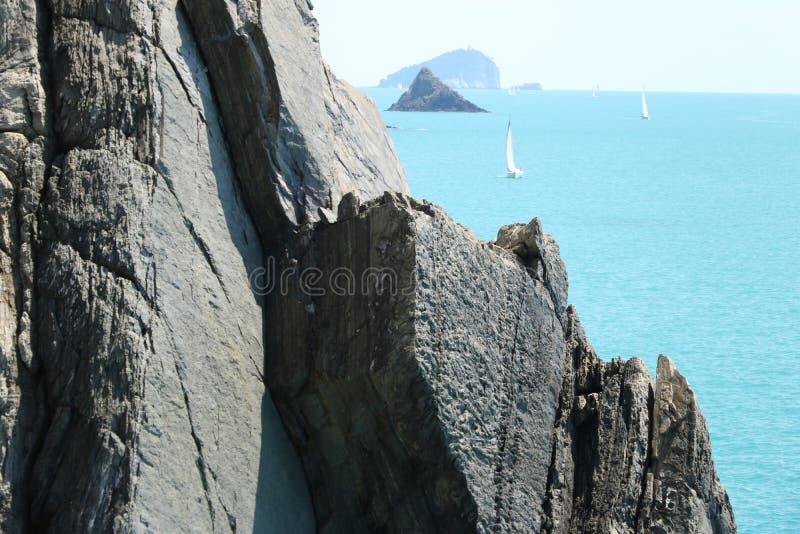 Cliff with Rocks that Plunge into the Blue Sea of the CinqueTerre Stock ...