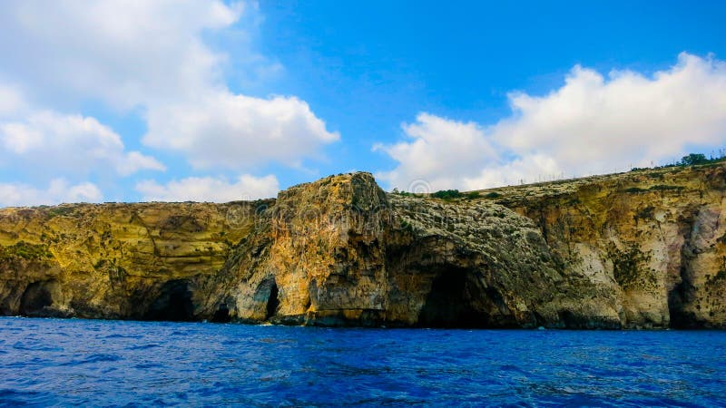 Cliff in sea stock image. Image of stone, rocky, green - 56787645