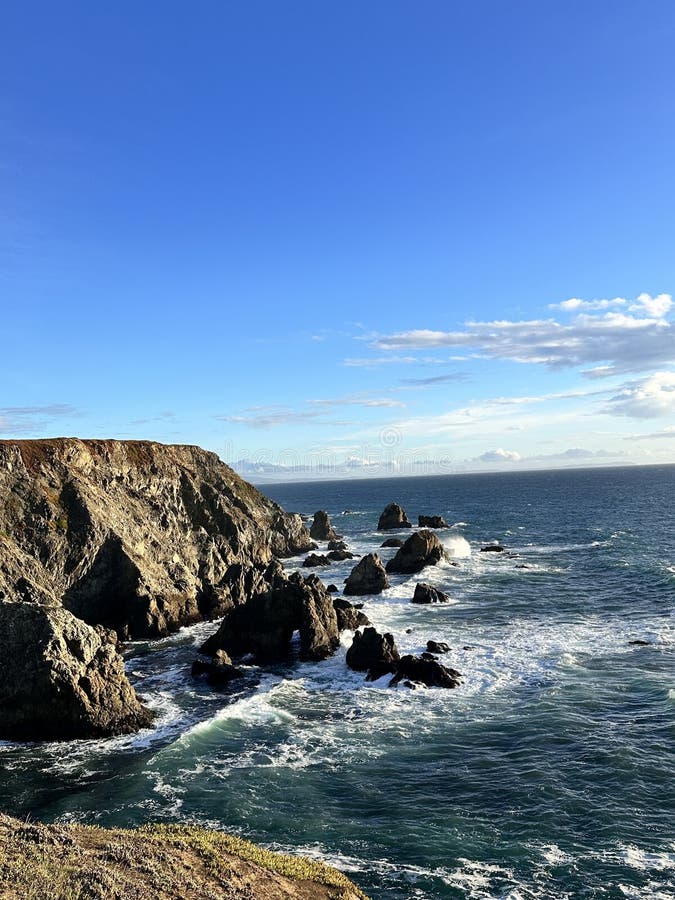 Cliff side of Bodega Bay stock image. Image of water - 303070265