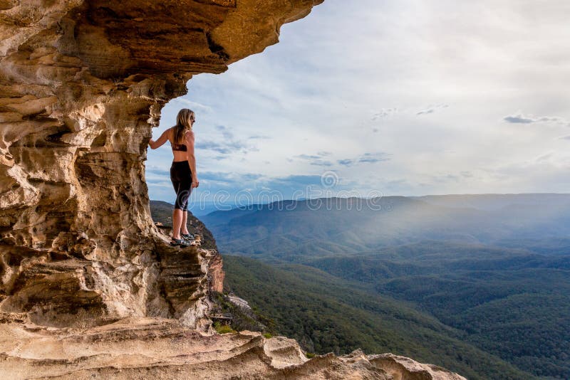 Cliff Side Cave with Mountain Valley Views Stock Photo - Image of rock ...
