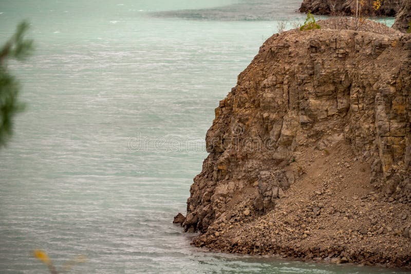 Cliff Side of a Quarry Lake Basin Stock Image - Image of next ...