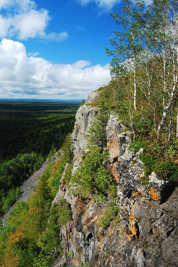 Cliff Side View stock image. Image of clouds, tree, scenic - 14432983