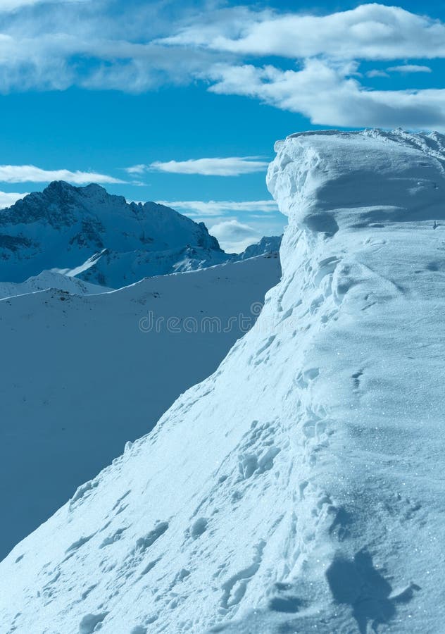 Steep Cliff Of Snow Mountain Stock Image - Image of forest, nature: 5868717