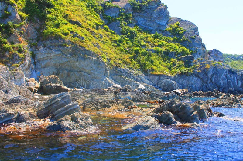 Cliff with vegetation stock photo. Image of famous, rock - 97782614
