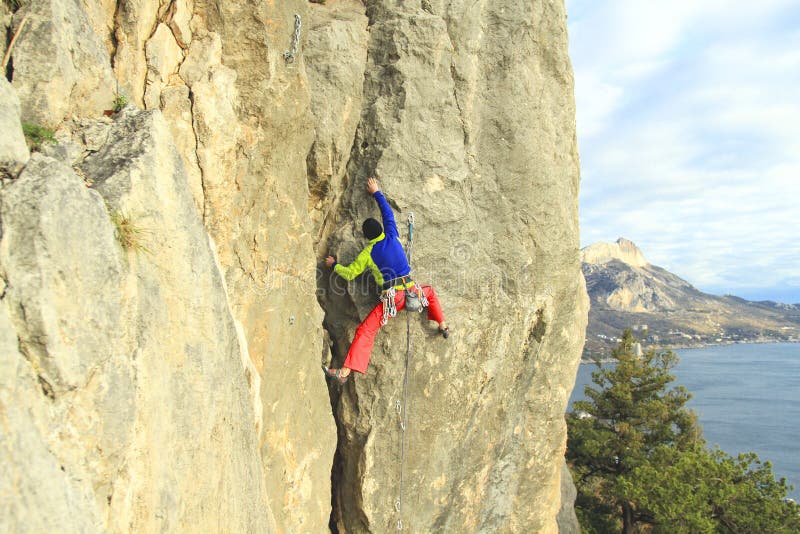Cliffhanger. stock photo. Image of fingers, exercise - 76847978