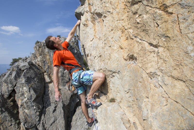Cliffhanger. stock image. Image of exercise, dangle, achievement - 78207365