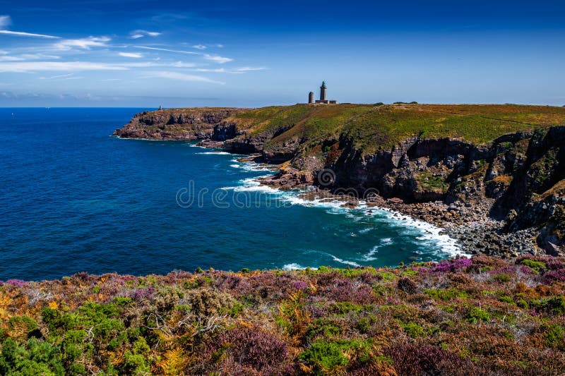 Cliffs at Atlantic Coast with Ancient Lighthouse at Cap Frehel in ...