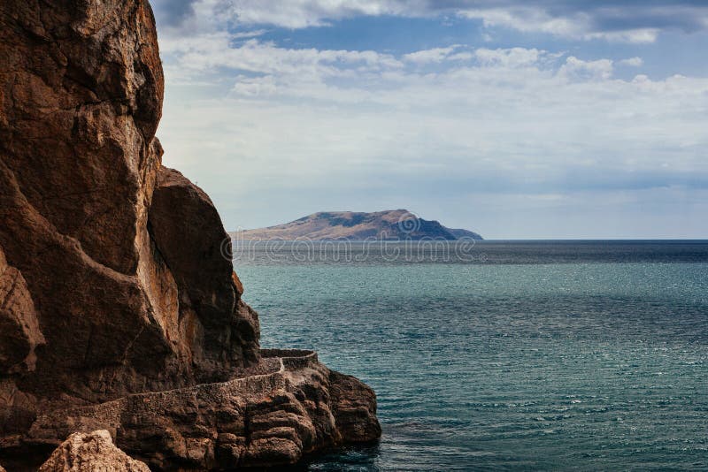 Cliffs and beach by day stock photo. Image of blue, landscape - 151497054