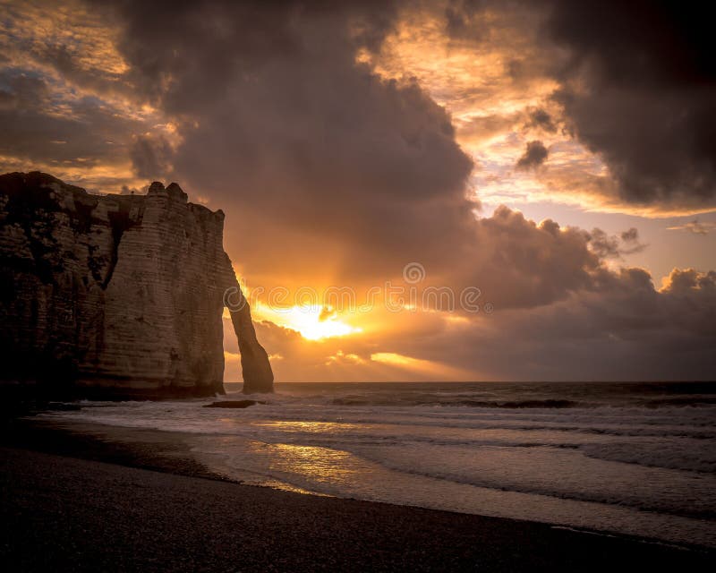 Cliffs on the Beach of Etretat, France, at Sunset Stock Photo - Image ...