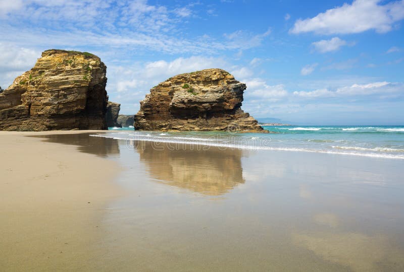 Cliffs at beach in summer stock photo. Image of ribadeo - 70678924