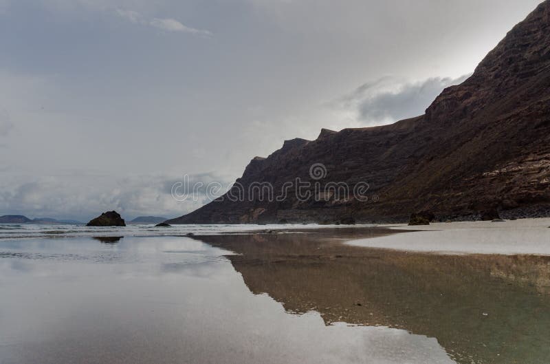 Cliffs in Famara De Caleta Lanzarote Stock Photo - Image of islands ...