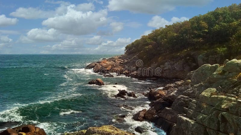 Cliffs by the Sea Being Hit by Waves Stock Photo - Image of rocks ...