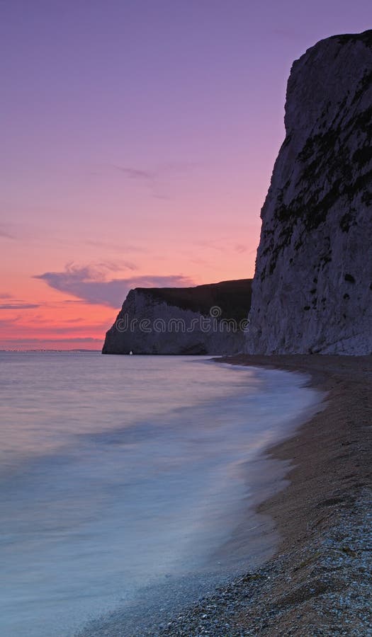Cliffs at sunset in Dorset stock photo. Image of beach - 25264782