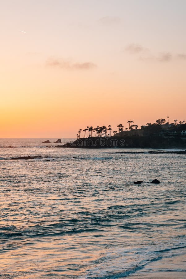 Cliffs and Waves in the Pacific Ocean at Sunset, in Laguna Beach ...