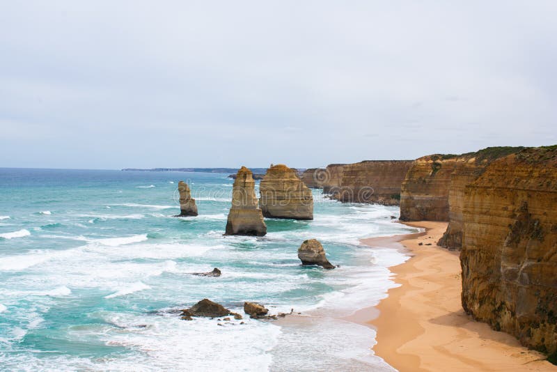 Cliffs on the Wavy Beach stock image. Image of scenery - 144820561