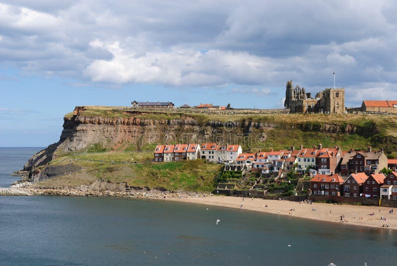Cliffs in Whitby, England stock image. Image of houses - 15627523