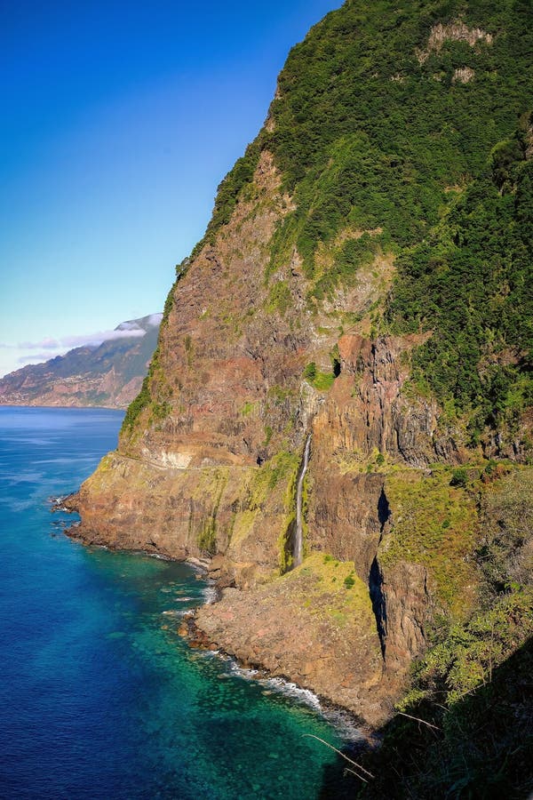 A Cliffside Cascading into the Atlantic Ocean in Madeira Stock Photo ...