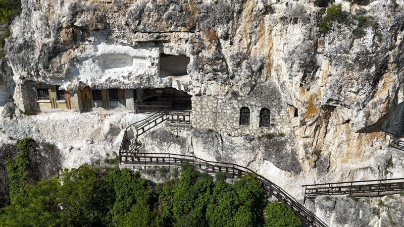 Cliffside Monastery with Rock-Hewn Structures Stock Image - Image of ...