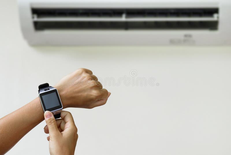 Climate Control with a Smartwatch. Woman Using AC. Stock Image - Image ...