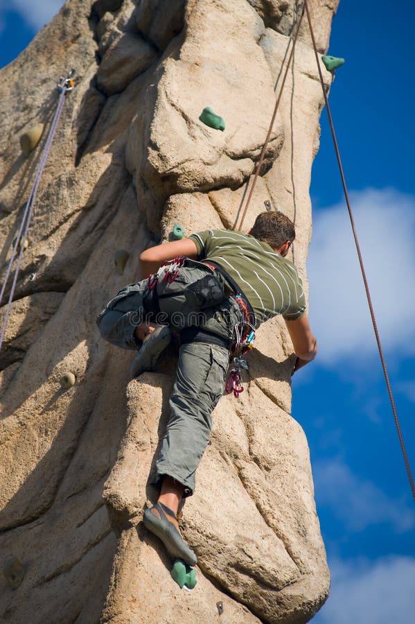 Climbing Team Struggles To the Summit. Stock Image - Image of grip ...