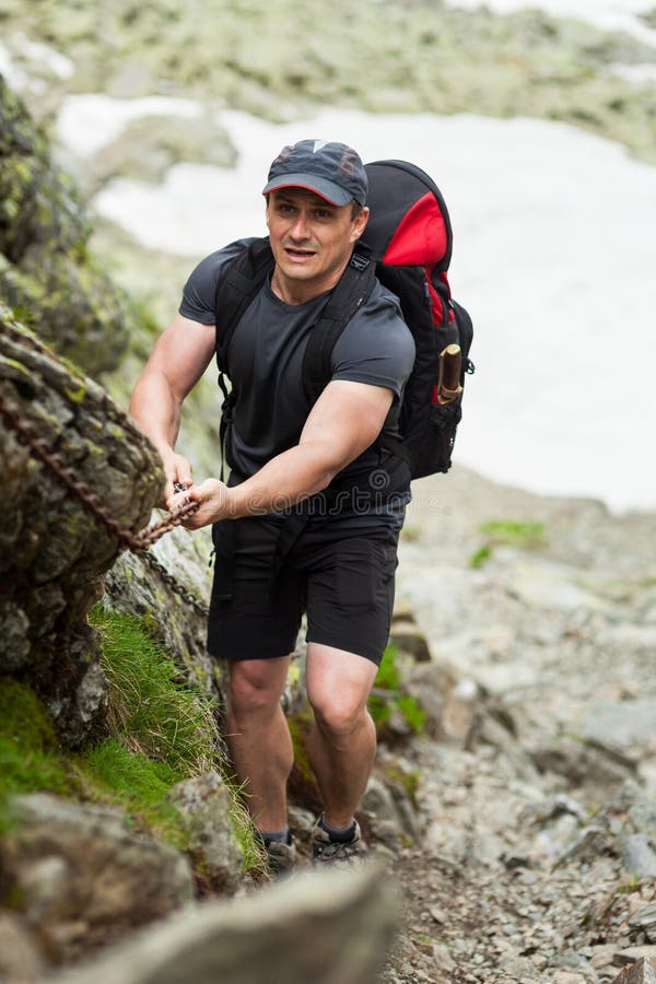 Climber with backpack stock image. Image of cable, altitude - 43175375