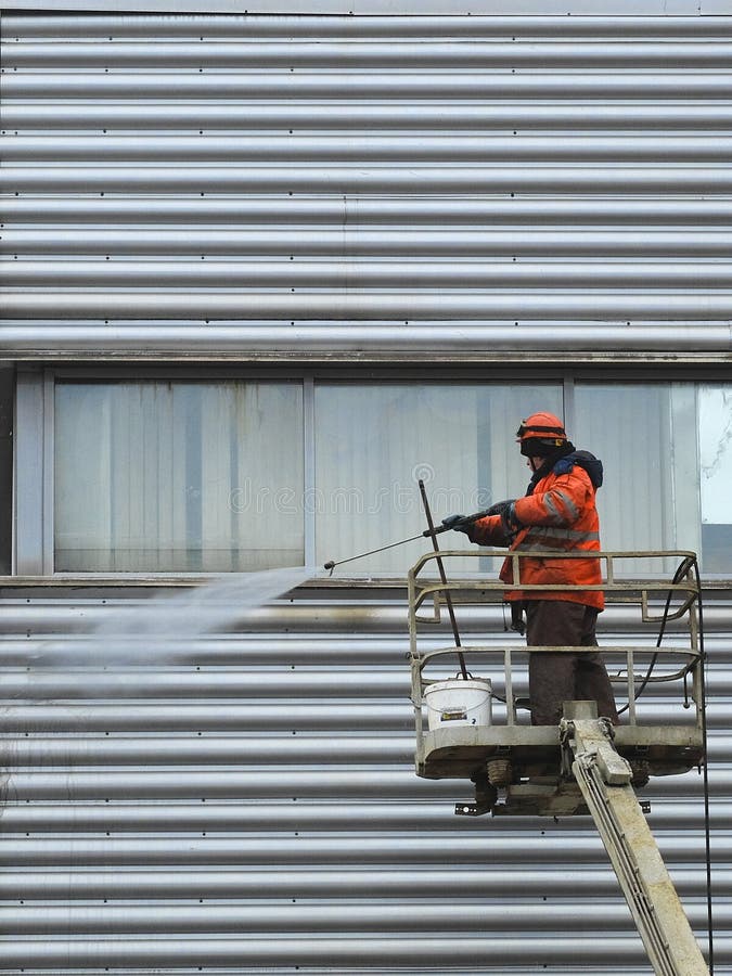 Climber Cleaning a Building Facade Editorial Stock Photo - Image of ...