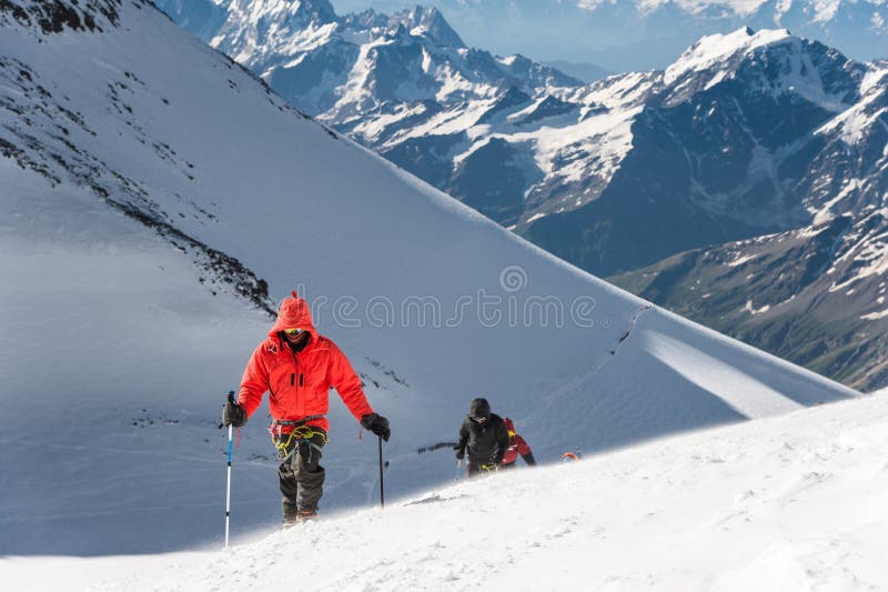 The Climber Climbs the Snow-covered Summit. Stock Photo - Image of ...