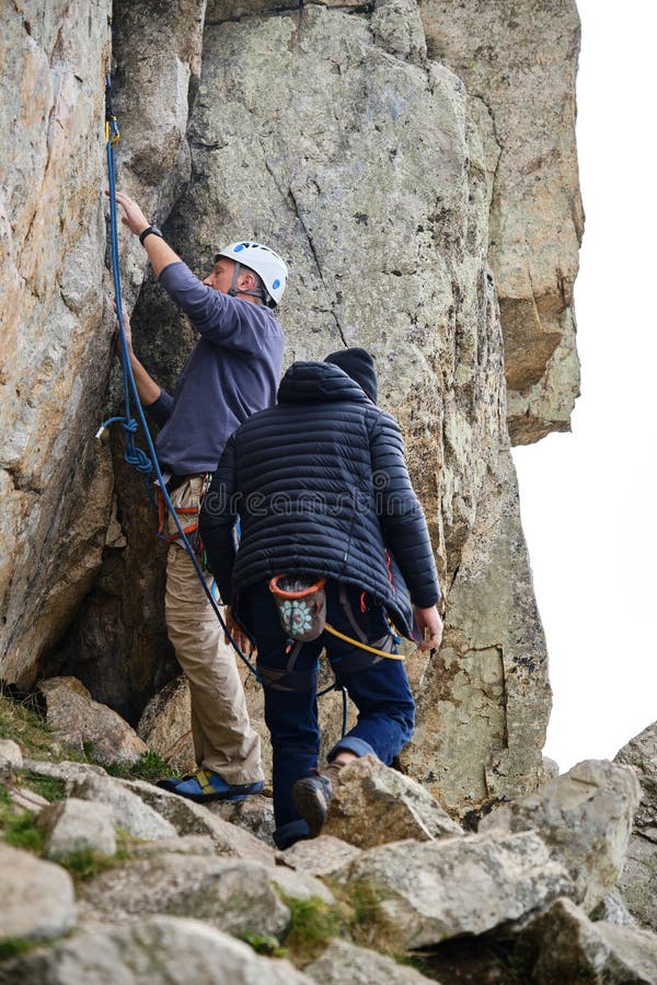 A Climber Concentrating before Starting the Climb Stock Photo - Image ...