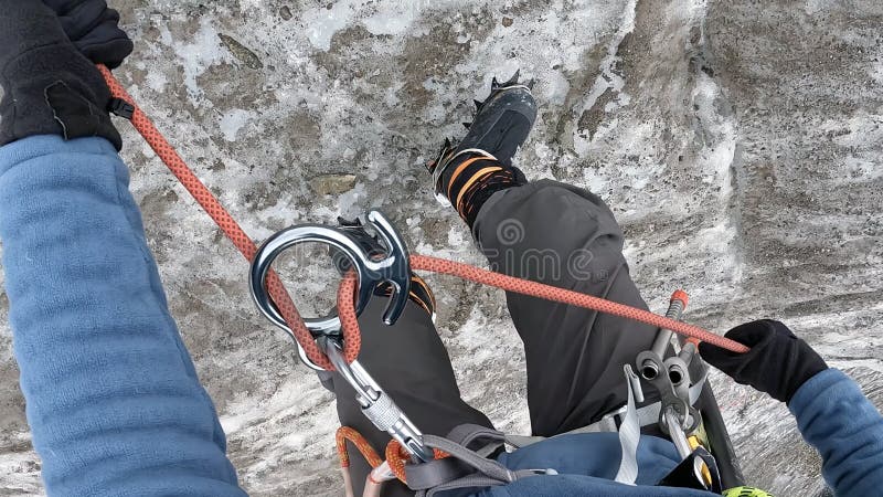 The Climber Descends Down the Vertical Railing on the Descent Device ...