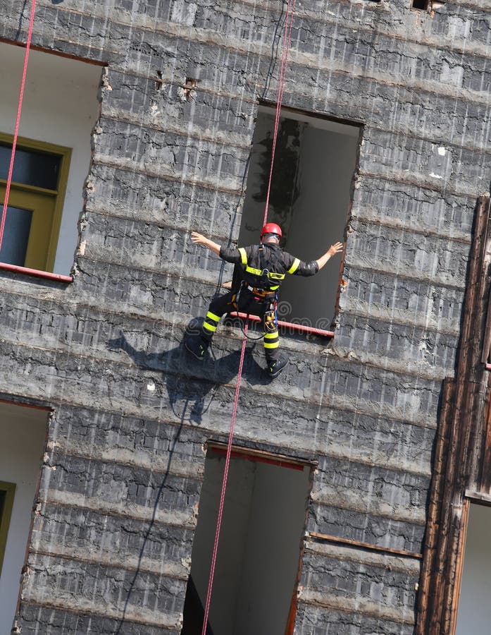 Firefighters Are Rappelling And Climbing Ropes Stock Photo - Image of ...