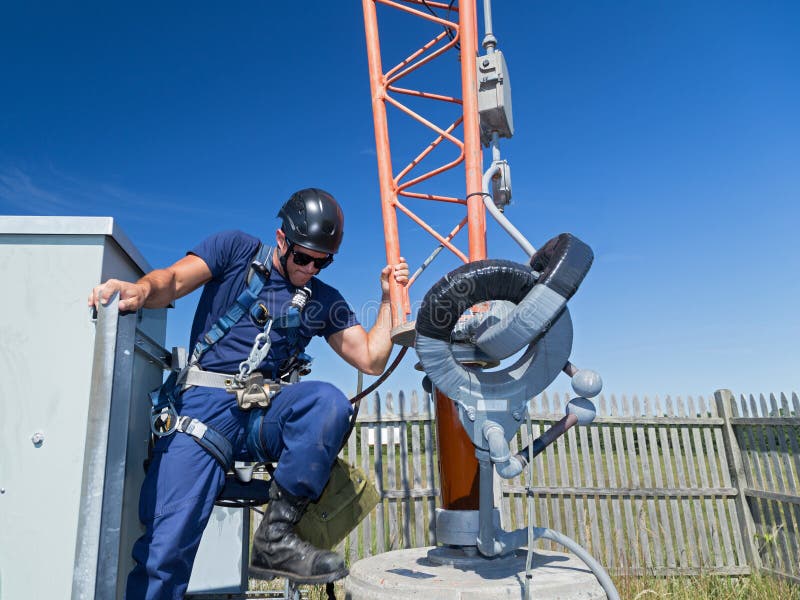 Climber Gets Ready To Climb Tower Stock Photo - Image of blue, ready ...