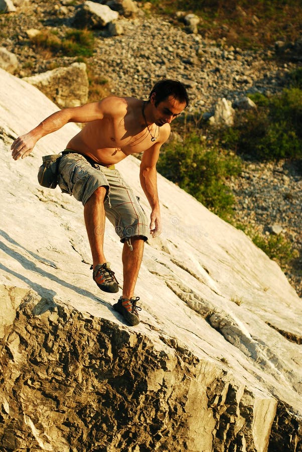 Climber Getting Down from a Boulder Stock Photo - Image of jumping ...