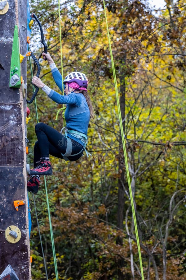 Climber with Ice Axes Climbing on Artificial Ice Climbing and ...
