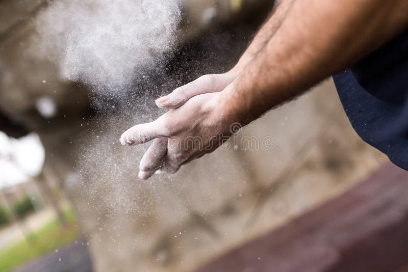 Climber Man Coating Her Hands in Powder Chalk Magnesium. Stock Photo ...