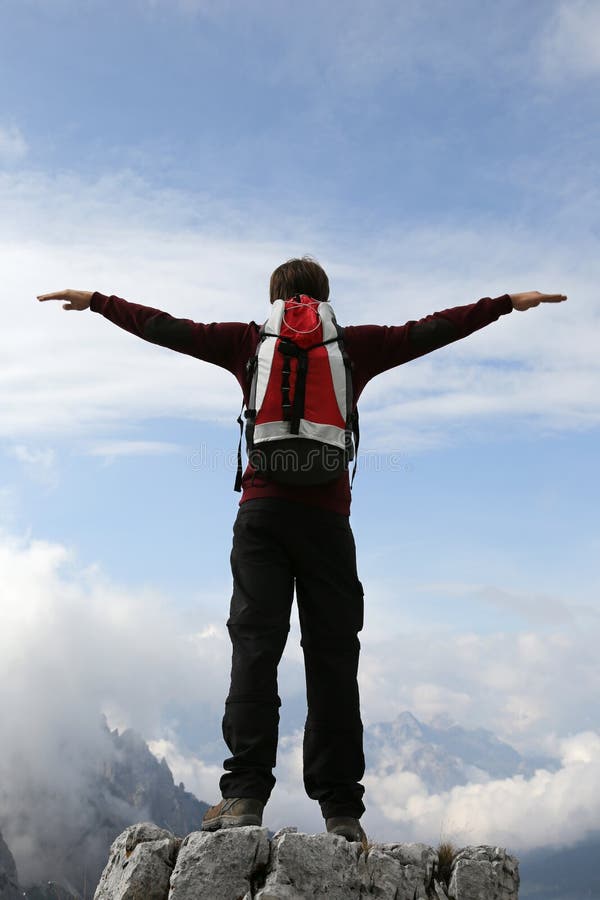 Climber on a Mountain Top Stretching His Arms Like Flying Stock Image ...