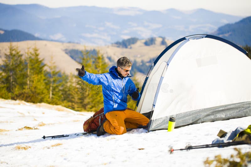 Climber near the tent. stock photo. Image of adventure - 73765924