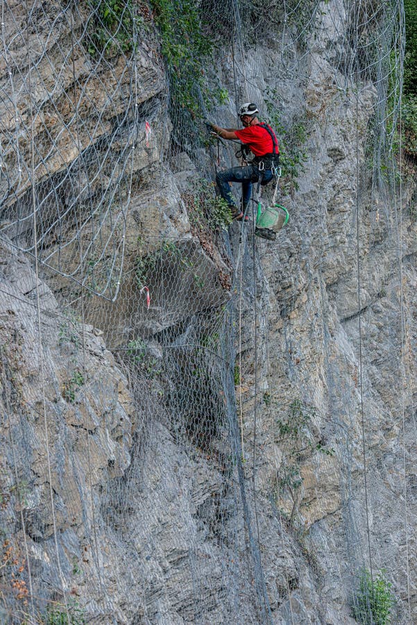 Climber Placing Safety Nets To Avoid Falling Rocks Editorial Stock ...