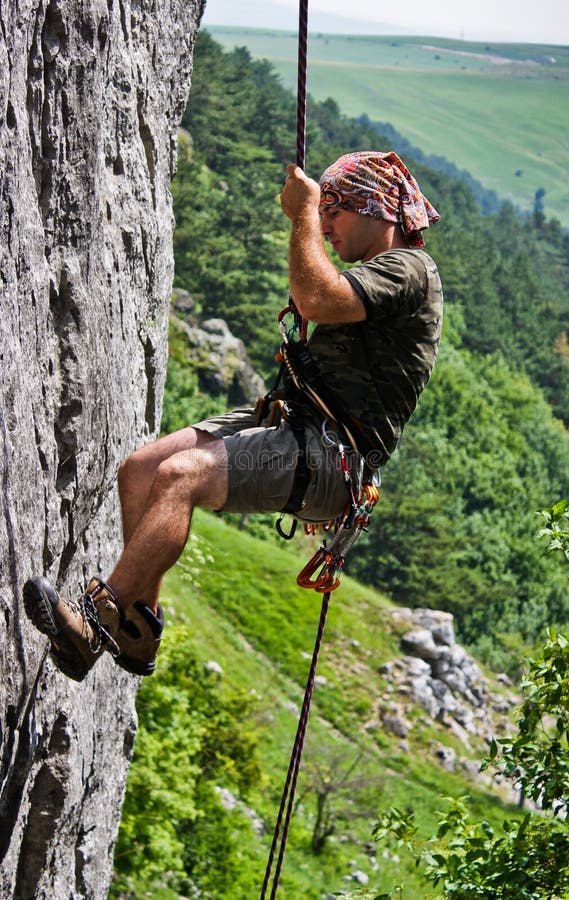 Climber rappeling stock image. Image of climber, courage - 15365119
