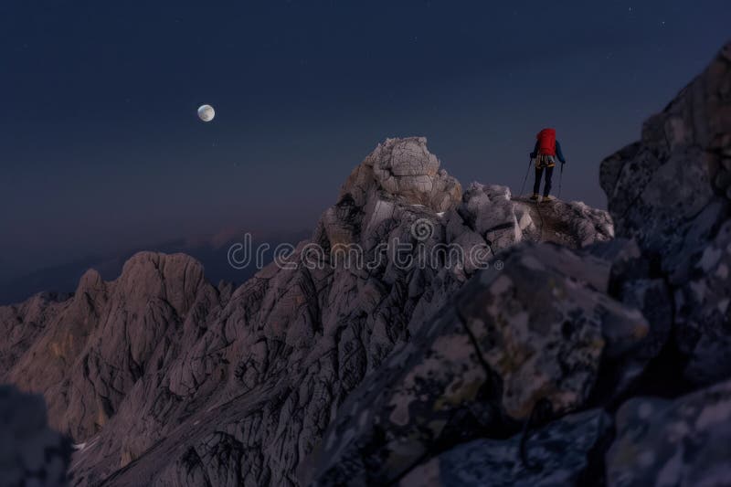 Climber Reaching Summit with Moon Overhead, Visible Trail Stock Photo ...