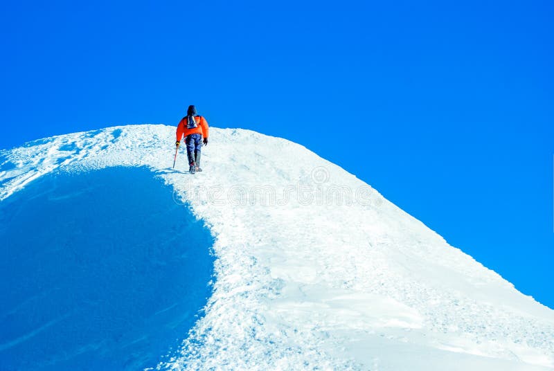 Climber at the Top of a Snowy Summit Stock Photo - Image of climber ...