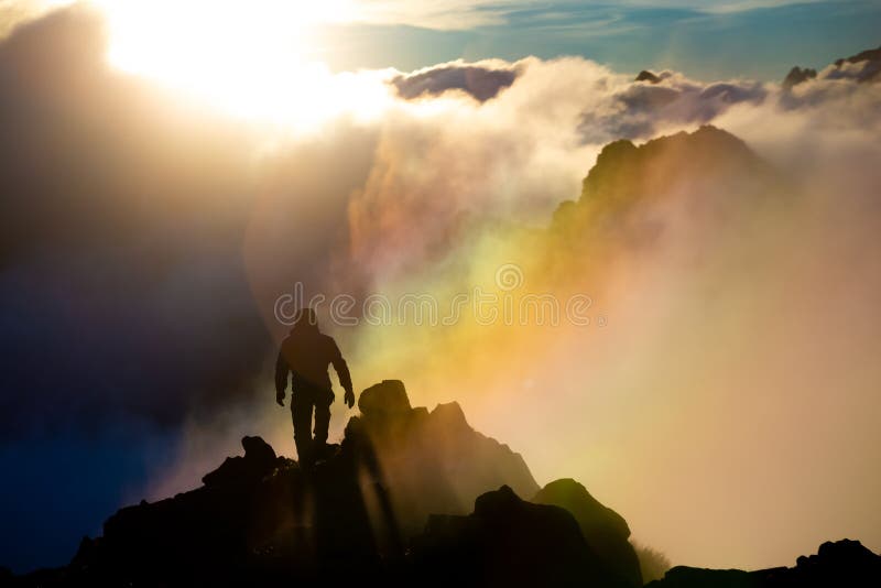 Climber Walking Along a Ridge during a Sunrise in the Clouds, Tatra ...