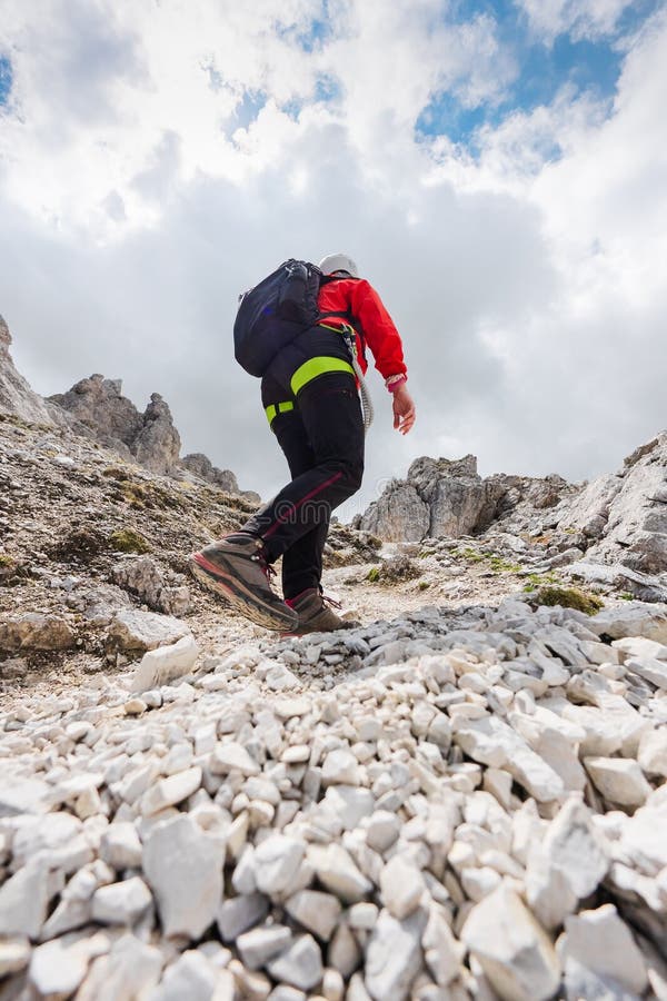 Climber Walking Up a Mountain Path Made of Gravel Stones Stock Image ...