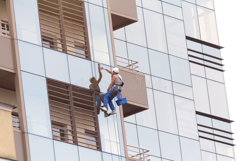 Climber Wash Windows and Glass Facade of the Skyscraper Editorial Image ...
