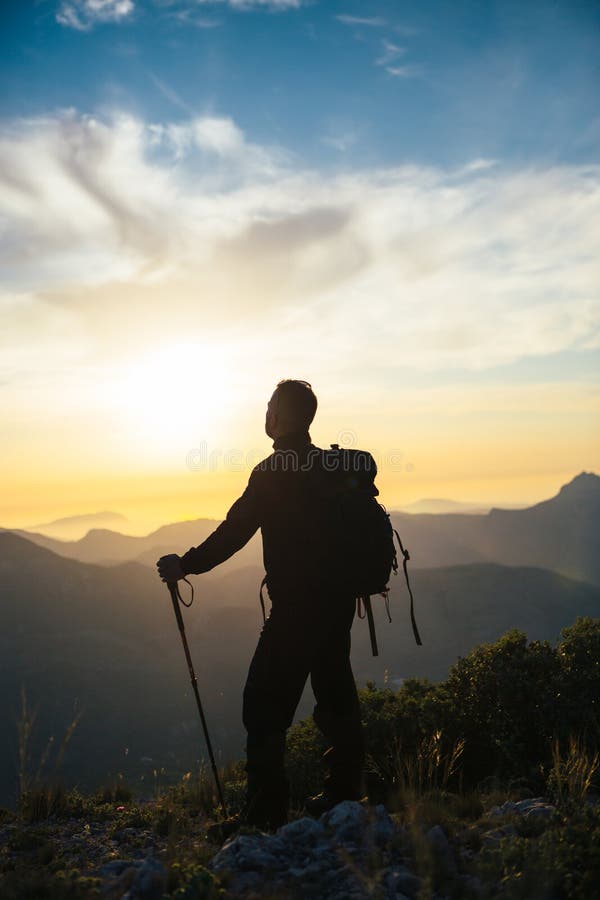 Climber Watching Sunset in Mountains Stock Photo - Image of vertical ...